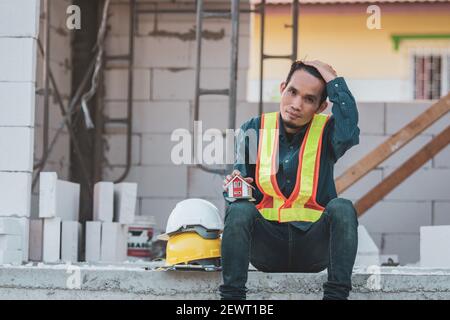 Worker employee work hard tried on site construction , Engineer ...