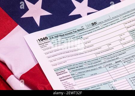 American concept. The US flag has a pen and a notebook with the ...