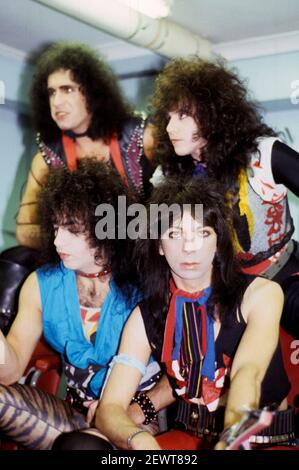 Standing: Gene Simmons/The Demon and Eric Carr/The Fox, sitting: Vinnie ...