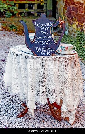 Traditional Devon cream tea in a farmhouse kitchen, with fruit scones ...