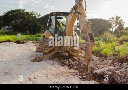 Jackhammer Attached To Backhoe Arm Stock Photo - Alamy