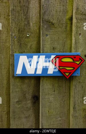 NHS logo with Superman badge displayed in support of National Health ...