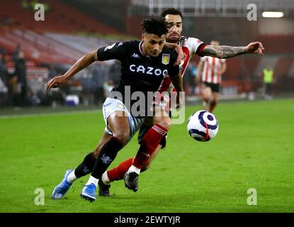 Aston Villa's Ollie Watkins (left) and Everton's James Garner battle ...