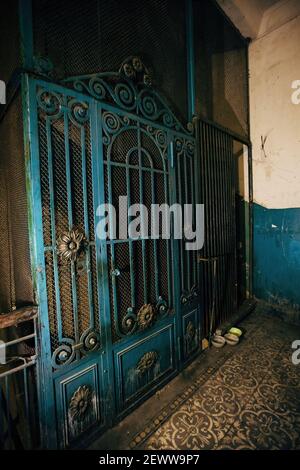 Old vintage rusty elevator gates in old mansion Stock Photo - Alamy