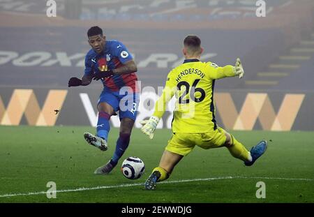 Crystal Palace's goalkeeper Dean Henderson, 2nd right, goes for the ...