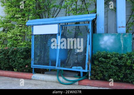 Broken and damaged chain link fence with orange background Stock Photo ...