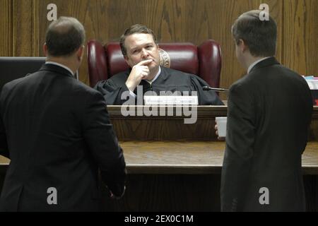 Erath County District Attorney Alan Nash watches video of the high ...