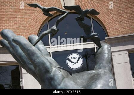 An exterior view of the headquarters of the National Oceanic and ...