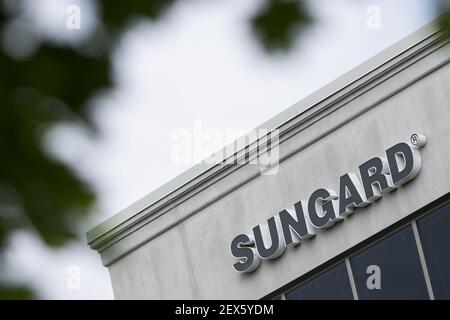 A logo sign outside of the headquarters of SunGard Data Systems in ...