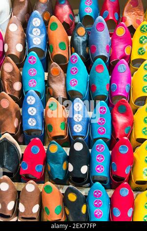 Traditional Moroccan leather slippers in the souq, market, in the ...