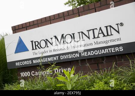 A logo sign outside the headquarters of the Iron Mountain Records ...
