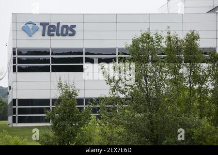 A logo sign outside of the headquarters of Telos Corporation, in ...