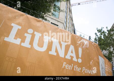 A logo sign outside of the headquarters of the Laborers' International ...