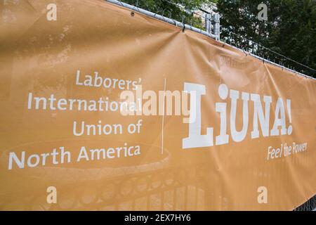 A logo sign outside of the headquarters of the Laborers' International ...