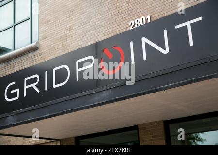 A logo sign outside of the headquarters of GridPoint in Arlington ...