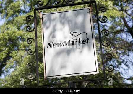 A logo sign outside of the headquarters of the NewMarket Corporation in ...