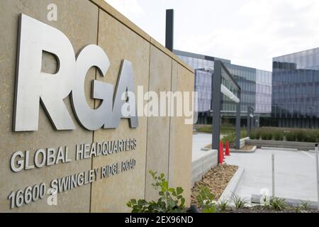 A logo sign outside of the headquarters of Reinsurance Group of America ...