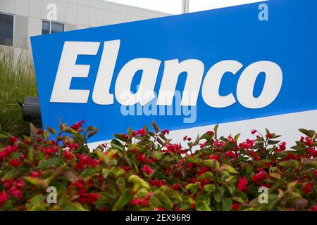 A logo sign outside of the headquarters of Elanco Animal Health, in ...