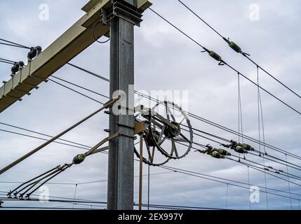 trolley pole connecting to electrical line Stock Photo - Alamy