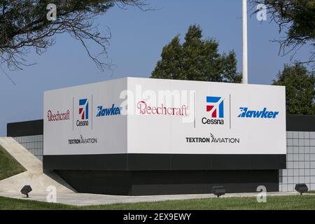 A logo sign outside of the headquarters of the Cessna Aircraft Company ...