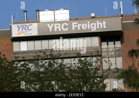 A logo sign outside of the headquarters of YRC Worldwide, Inc., in ...