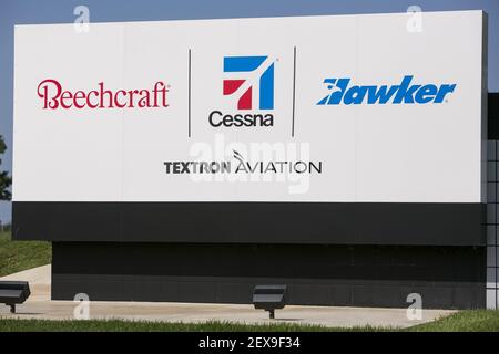 A logo sign outside of the headquarters of the Cessna Aircraft Company ...