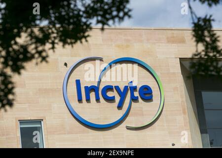 A logo sign outside of the headquarters of the Incyte Corporation in ...