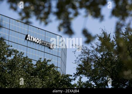 A logo sign outside of the headquarters of The Atmos Energy Corporation ...