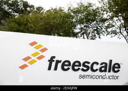A logo sign outside of the headquarters of Freescale Semiconductor Inc ...