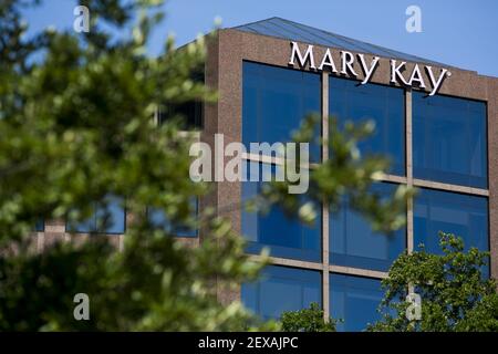 A logo sign outside of the headquarters of Mary Kay, Inc., in Addison ...