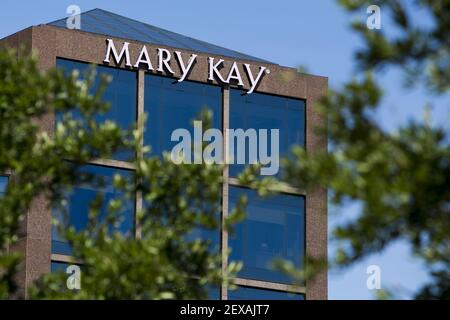 A logo sign outside of the headquarters of Mary Kay, Inc., in Addison ...