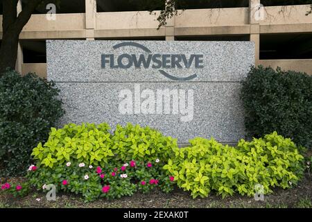 A logo sign outside of the headquarters of The Flowserve Corporation in ...