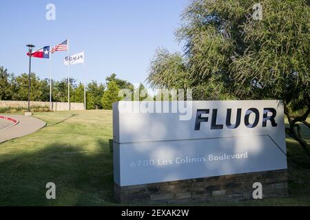 A logo sign outside of the headquarters of the Fluor Corporation in ...