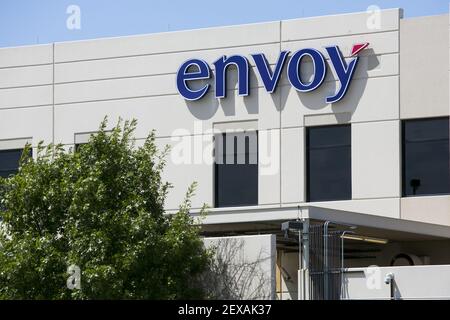 A logo sign outside of the headquarters of Envoy Air Inc., the parent ...