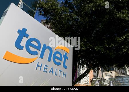 A logo sign outside of the headquarters of the Tenet Healthcare ...