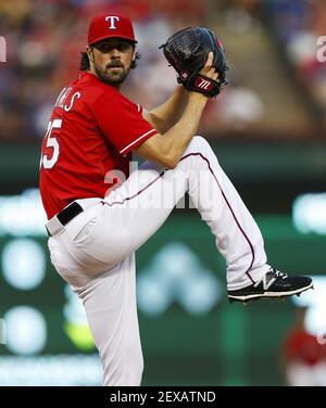 Texas Rangers starting pitcher Cole Ragans winds up to deliver to the ...
