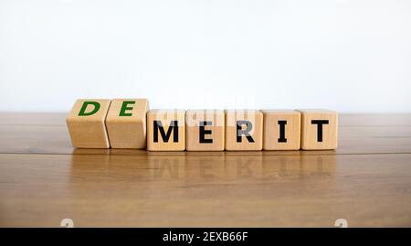 Demerit or merit symbol. Turned wooden cubes and changed words 'demerit ...