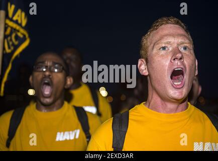 U.S. Navy Sailors recite the Sailors Creed prior to an award ceremony ...
