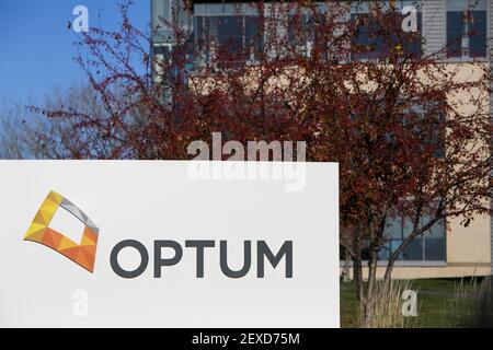 A logo sign outside of the headquarters of Optum in Eden Prairie ...