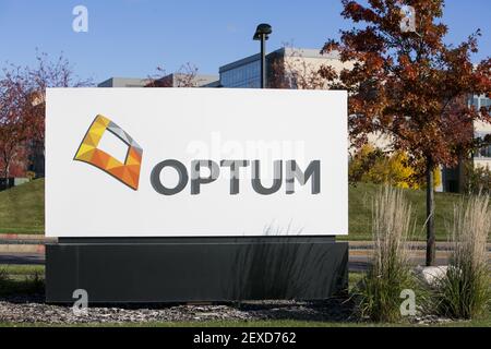 A logo sign outside of the headquarters of Optum in Eden Prairie ...