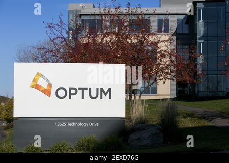 A logo sign outside of the headquarters of Optum in Eden Prairie ...
