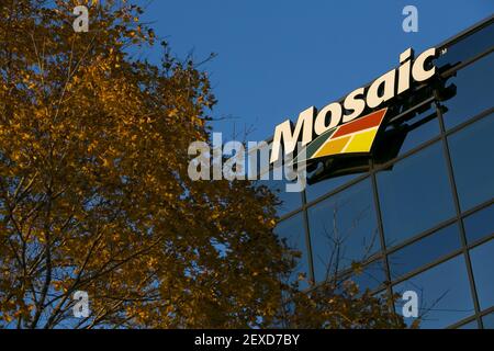A logo sign outside of the headquarters of The Mosaic Company in ...
