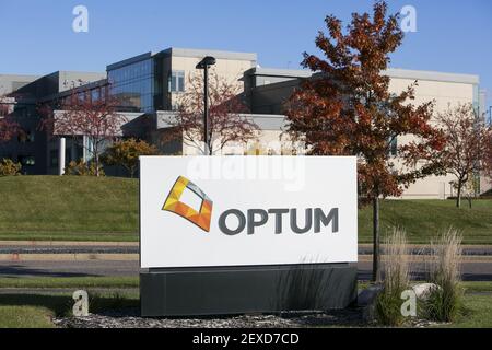 A logo sign outside of the headquarters of Optum in Eden Prairie ...