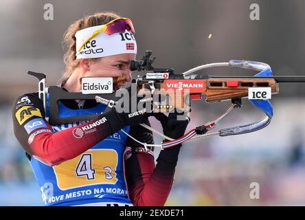 Ida Lien of Norway shoots during the women's 15k individual race at the ...