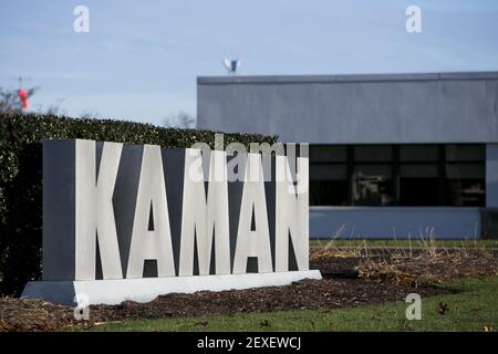 A logo sign outside of the headquarters of Kaman Aerospace Corporation ...
