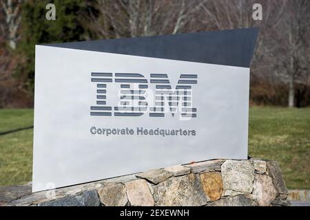 A logo sign outside of the headquarters of IBM in Armonk, New York on ...