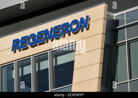 A logo sign outside of the headquarters of Regeneron Pharmaceuticals ...