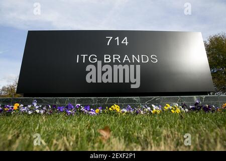 A logo sign outside of the headquarters of the ITG Brands in Greensboro ...