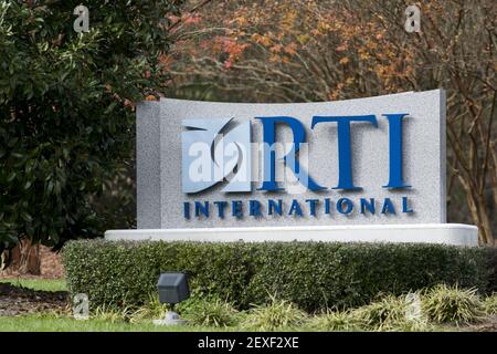 A logo sign outside of the headquarters of RTI International in ...