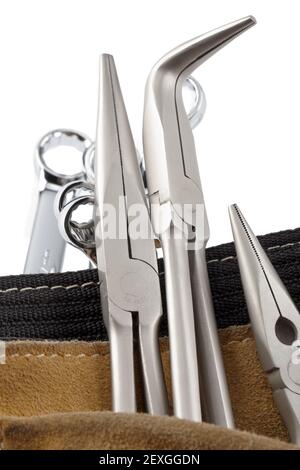 Brown leather toolbelt with construction tools on wood board directly ...